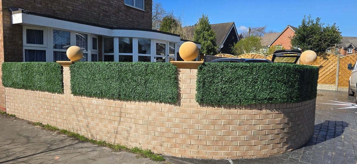 Artificial Hedge Installation On A Curved Brick Wall – Hedgedin